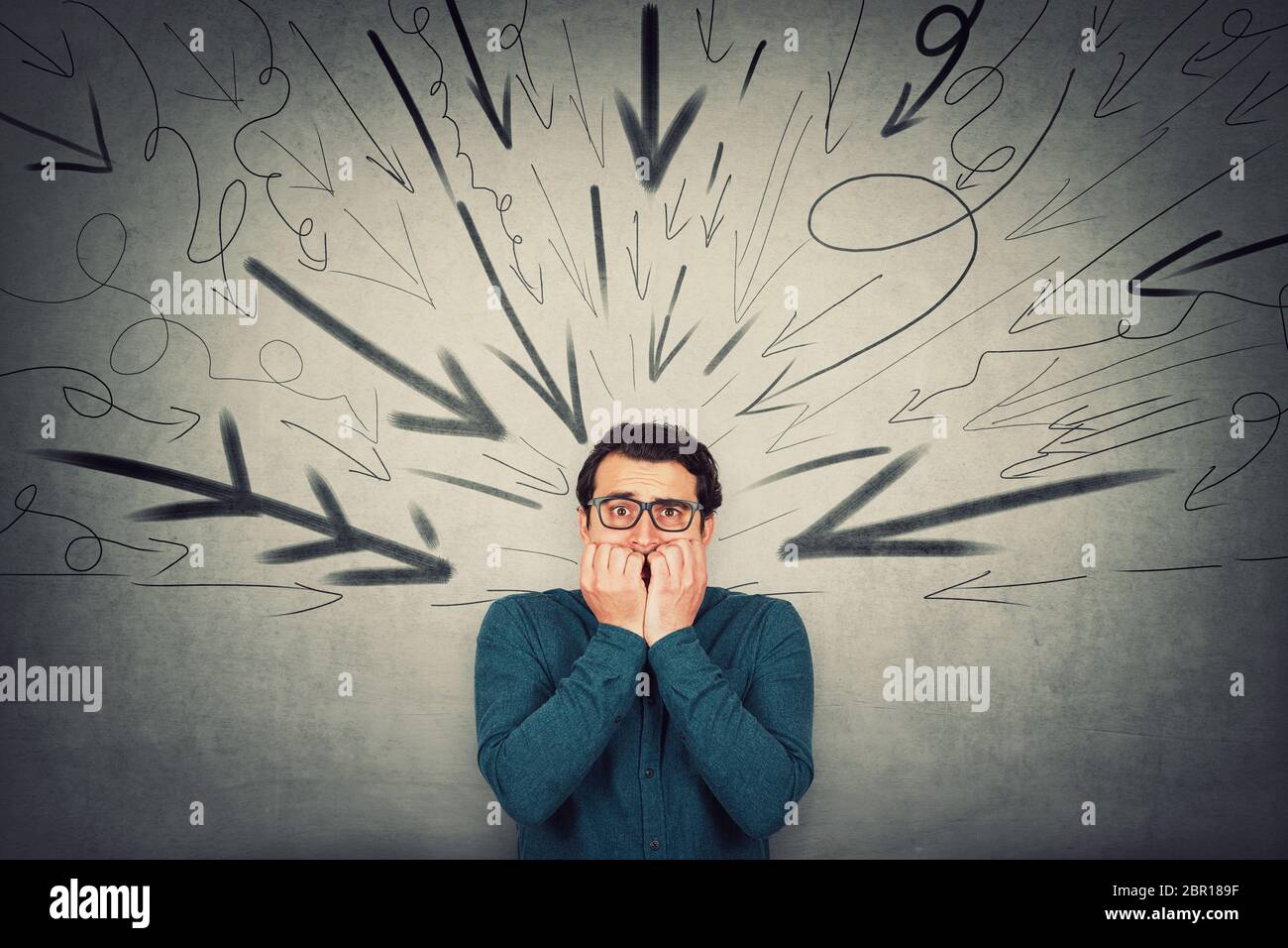 Stressful businessman, looks scared, biting his finger nails, nervous ... Stressful businessman, looks scared, biting his finger nails, nervous ...