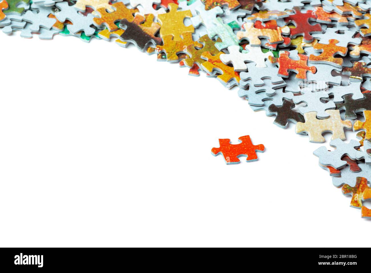 Bright orange puzzle piece and many puzzle pieces background Stock ...