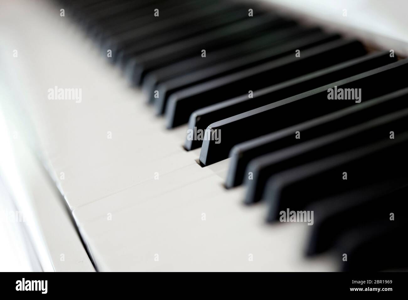 Close up of a grand piano in a music room Stock Photo - Alamy
