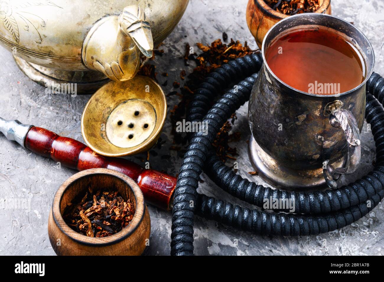 East smoking hookah. Arabian shisha with tea. Hookah and tea Stock ...