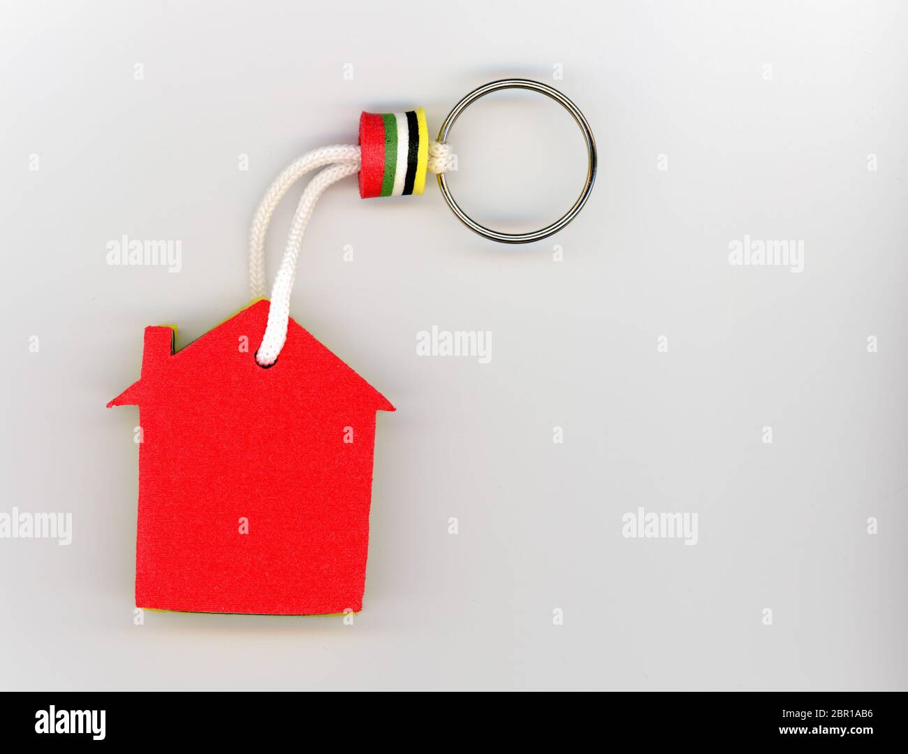 red foam house shaped keyring without keys Stock Photo - Alamy