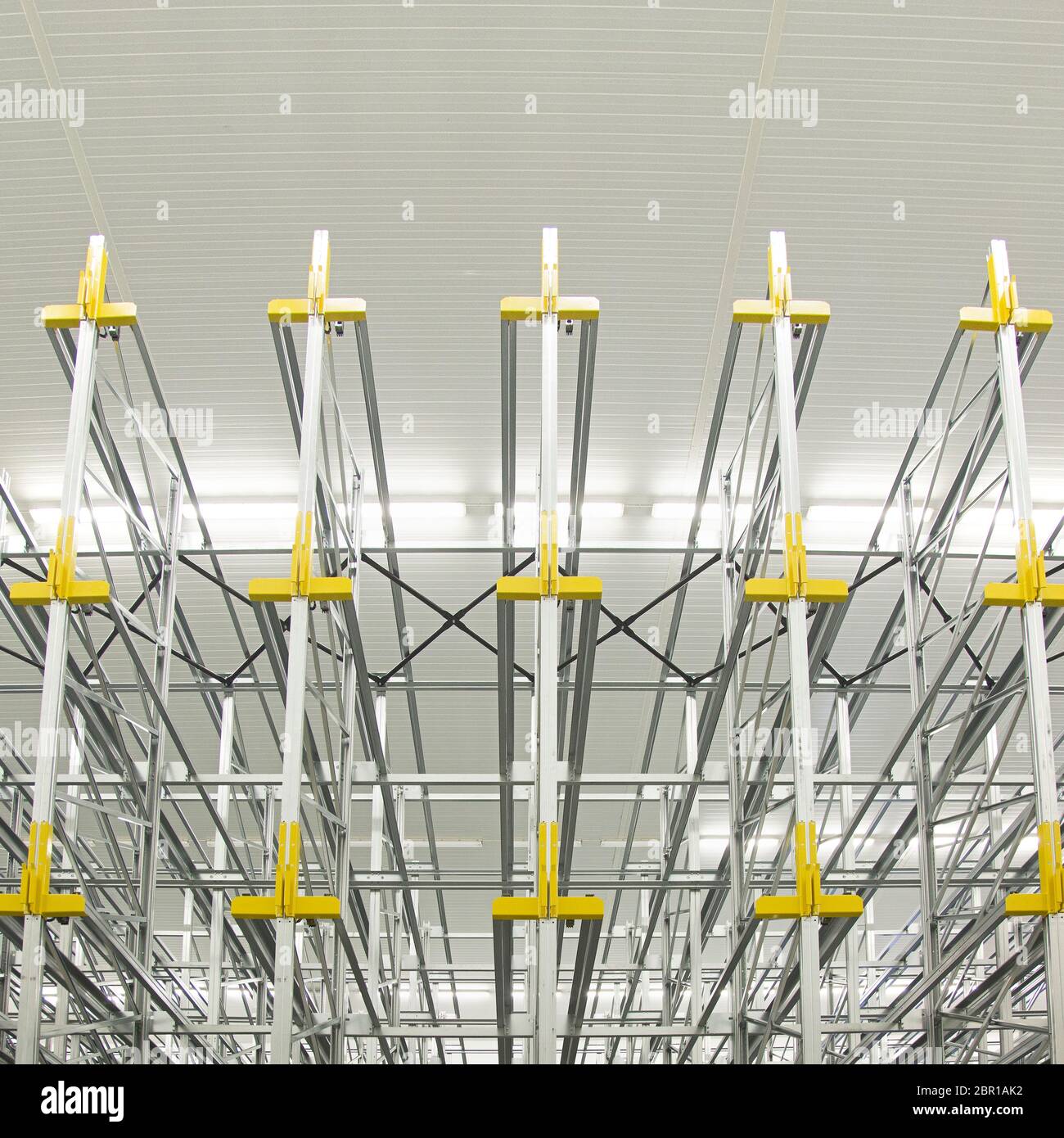 Empty Shelving System Rails in New Automated Warehouse Stock Photo - Alamy