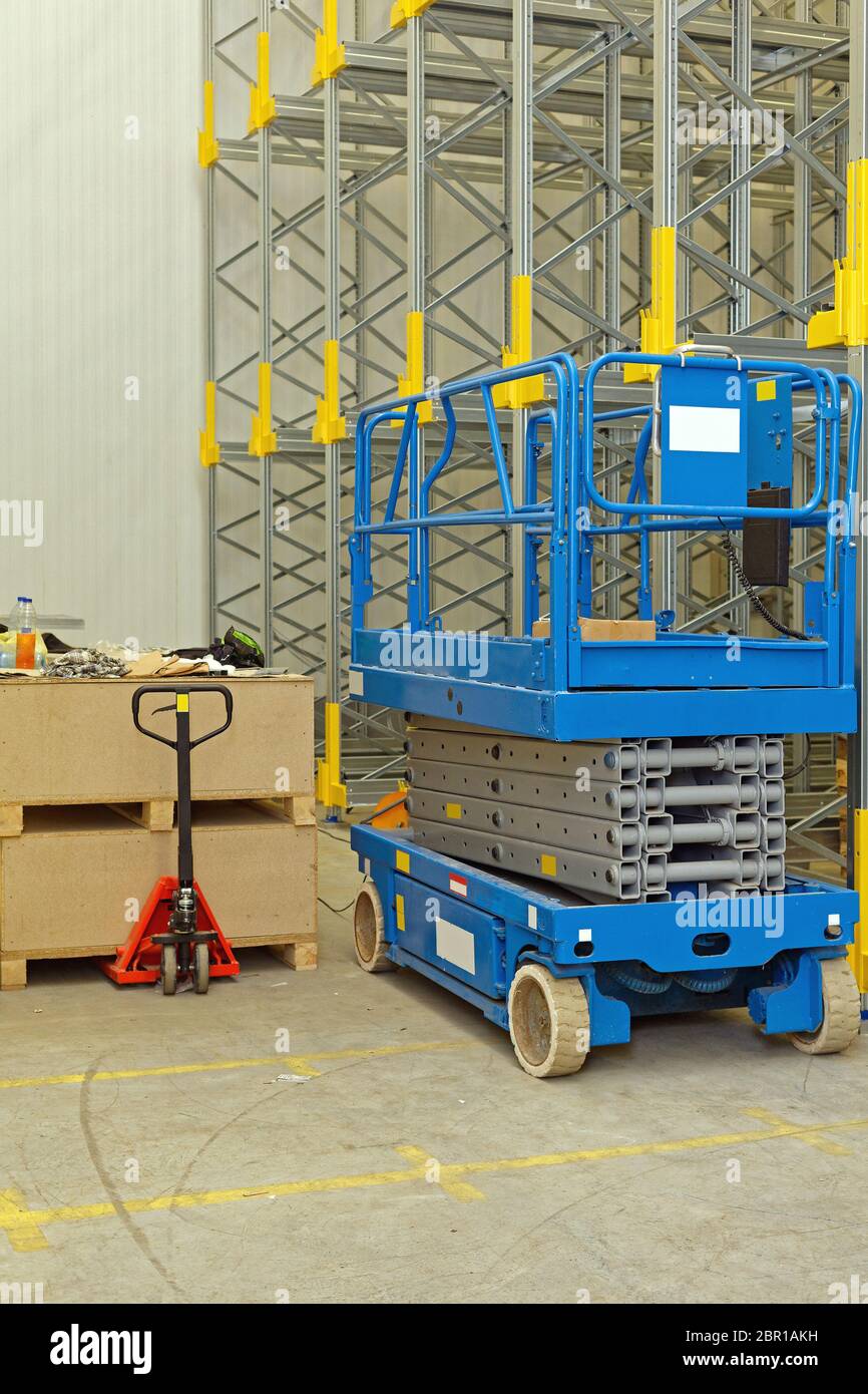 Scissor Lift at Construction Site in Distribution Warehouse Stock Photo ...