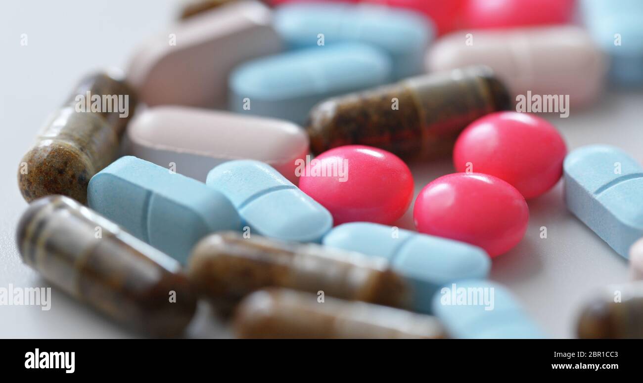 Group of different medicine in rotation Stock Photo - Alamy