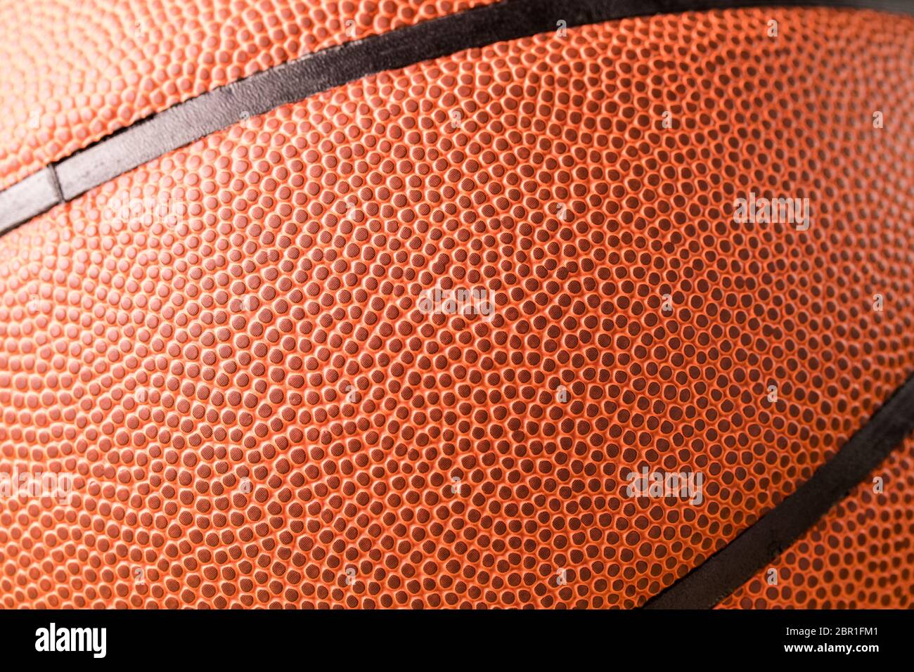 Orange basketball skin texture Stock Photo - Alamy