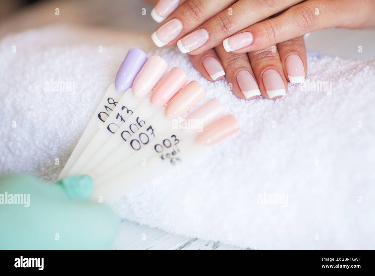 New manicure. Side view of the process of manicure in salon ...