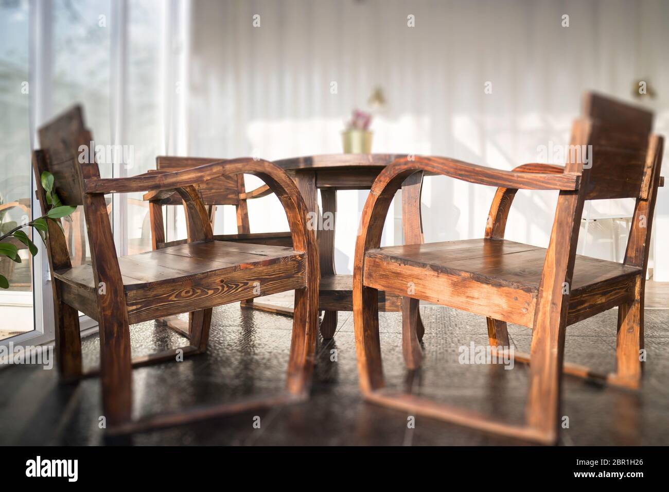 Cargo container cafe with wooden furniture set, stock photo Stock Photo ...