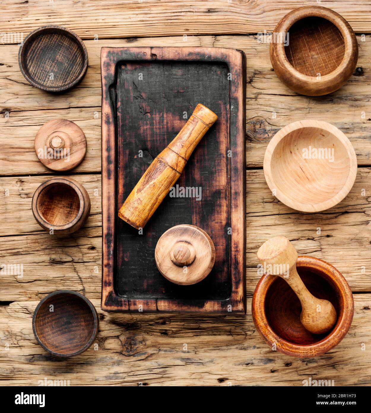 Empty wooden mortar and pestle on wooden old background.Cooking ...