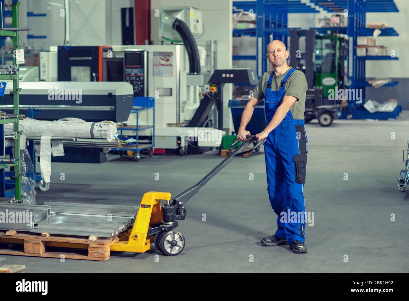 Hand pallet truck lift work hi-res stock photography and images - Alamy