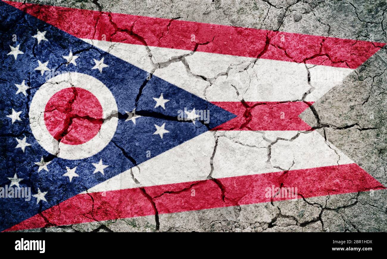 Flag of the U.S. state of Ohio on dry earth ground texture background ...