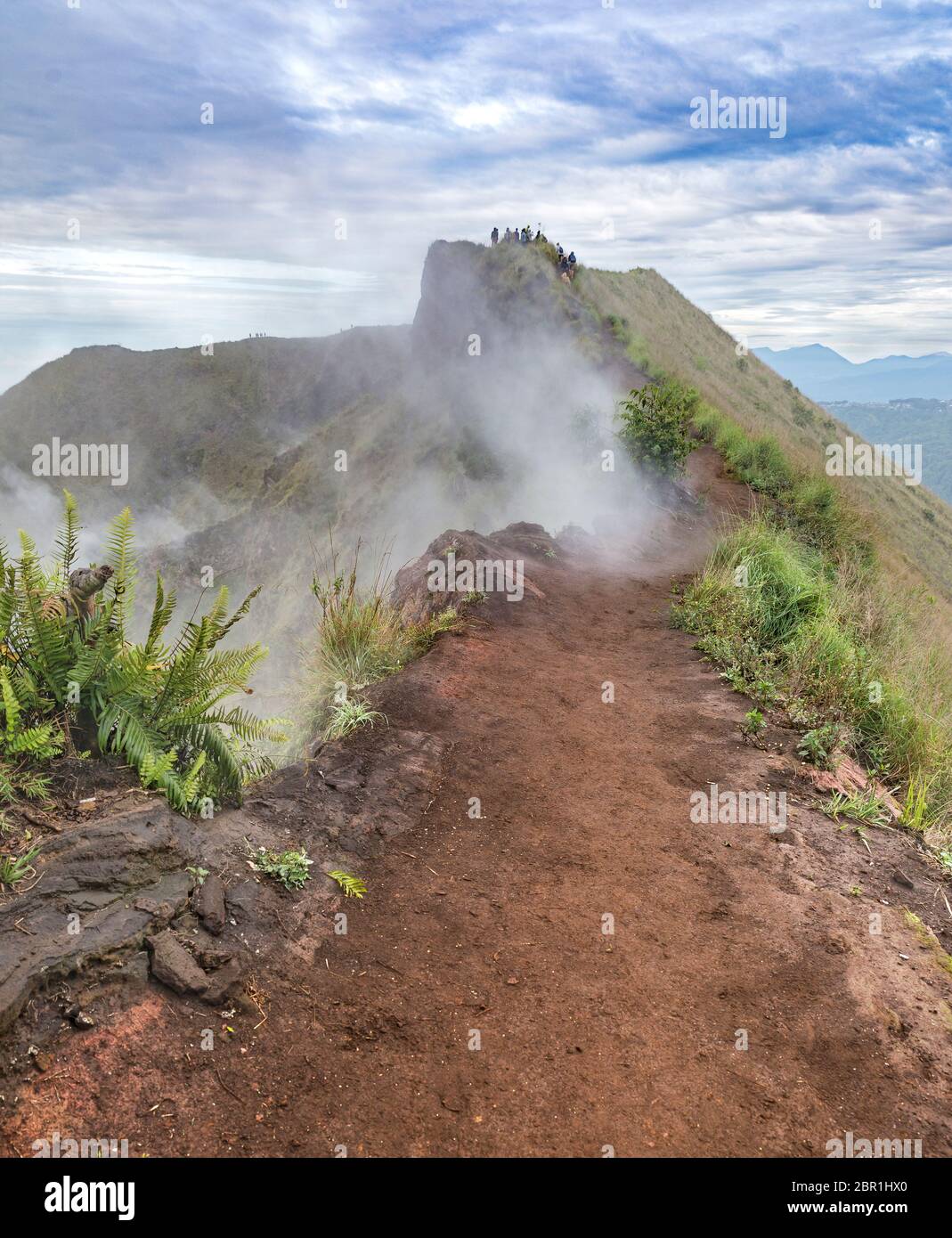 hiking on top of an indonesian vulcano Stock Photo - Alamy