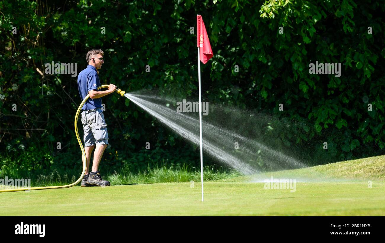 Maintenance worker tending to golf course hi-res stock photography and ...