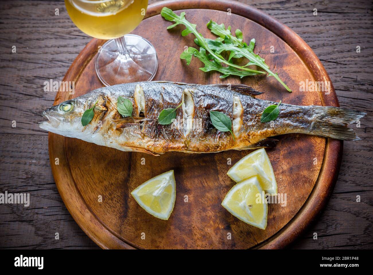 Seabass cooked whole hi-res stock photography and images - Alamy