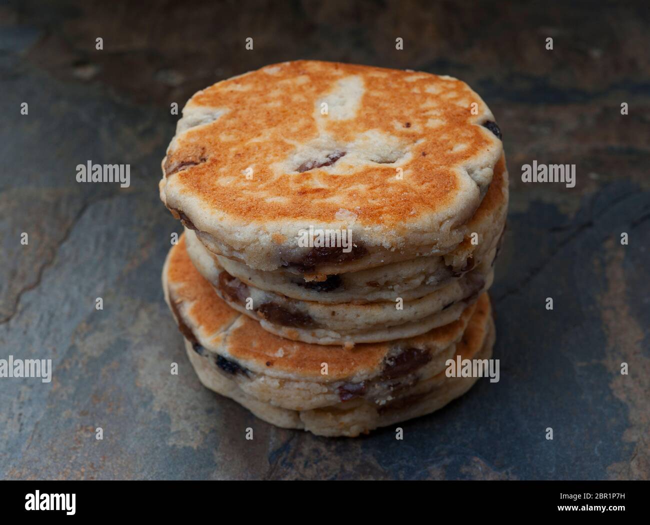Traditional griddled Welsh cakes on a natural slate background Stock ...