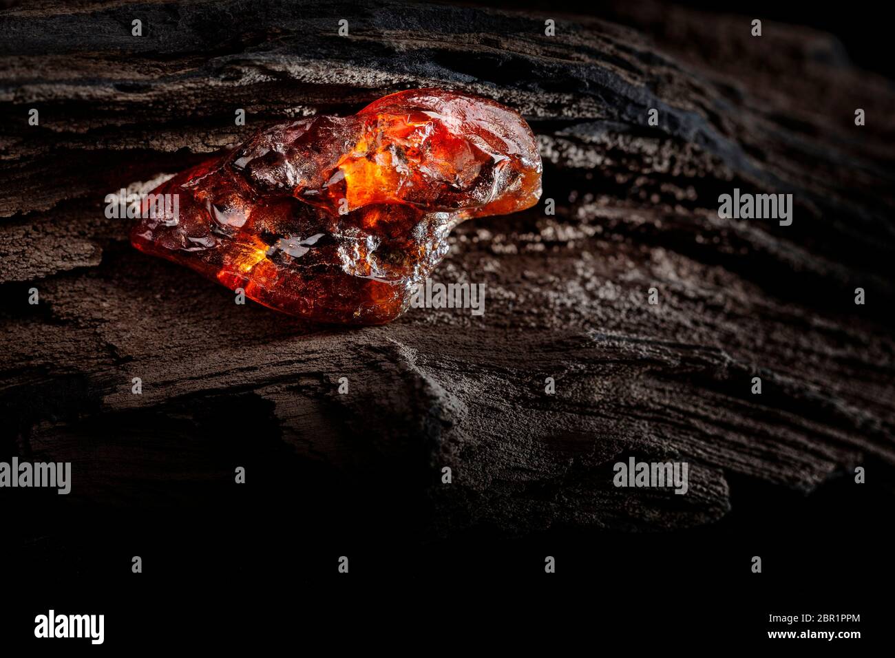 A piece of yellow semi transparent natural amber, classification color ...