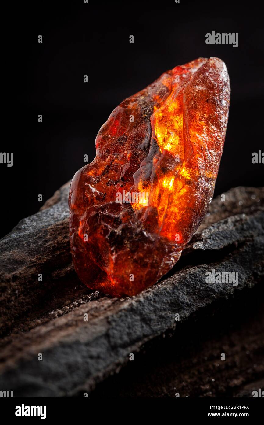 A piece of yellow semi transparent natural amber, classification color ...