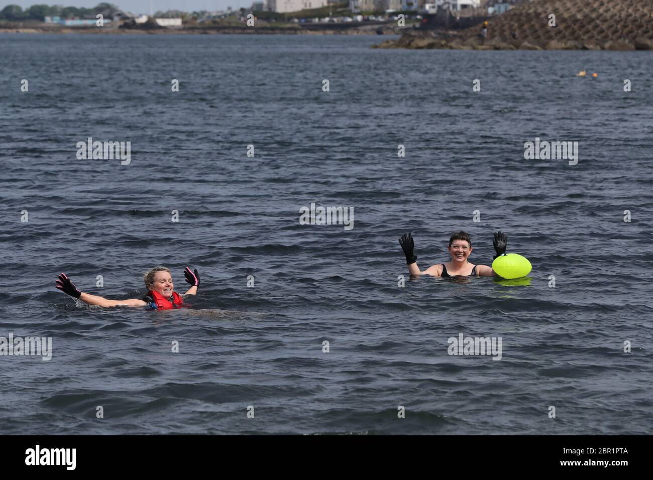 Helena Rogan (left) and Jude Smith swimming at skipping stone beach in ...