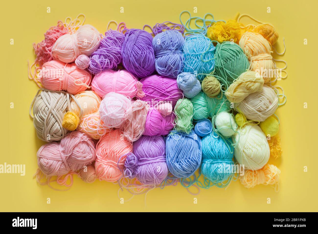 Colored balls of yarn. View from above. Rainbow colors. All colors ...