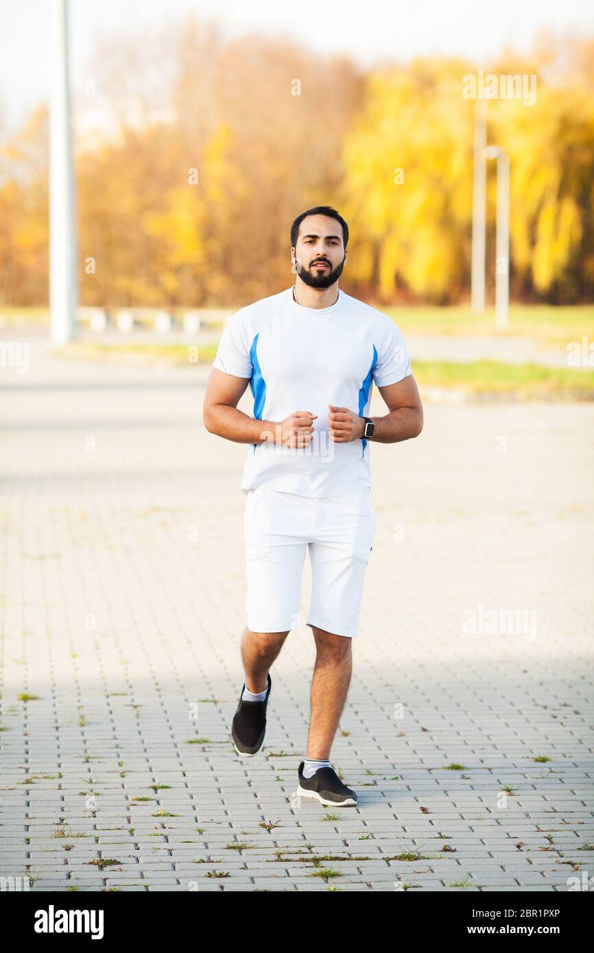 Fitness. Stretch man doing stretching exercise. Standing forward bend ...