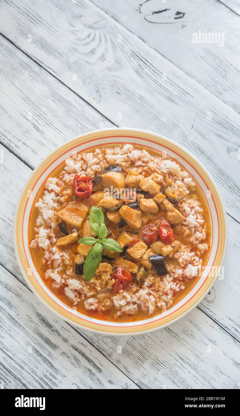 Thai red chicken curry with white rice Stock Photo - Alamy