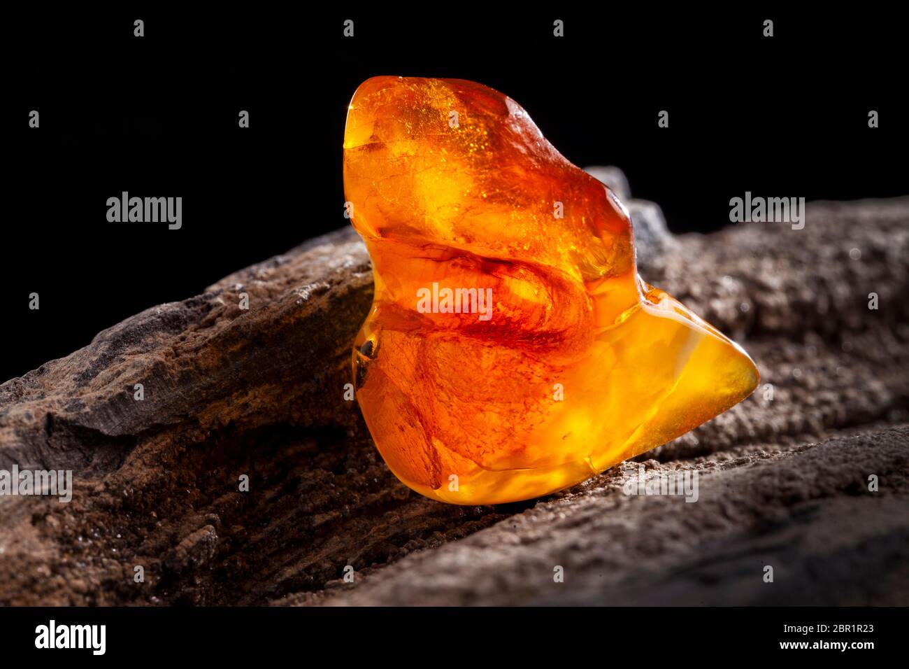 A piece of yellow semi transparent natural amber, classification color ...