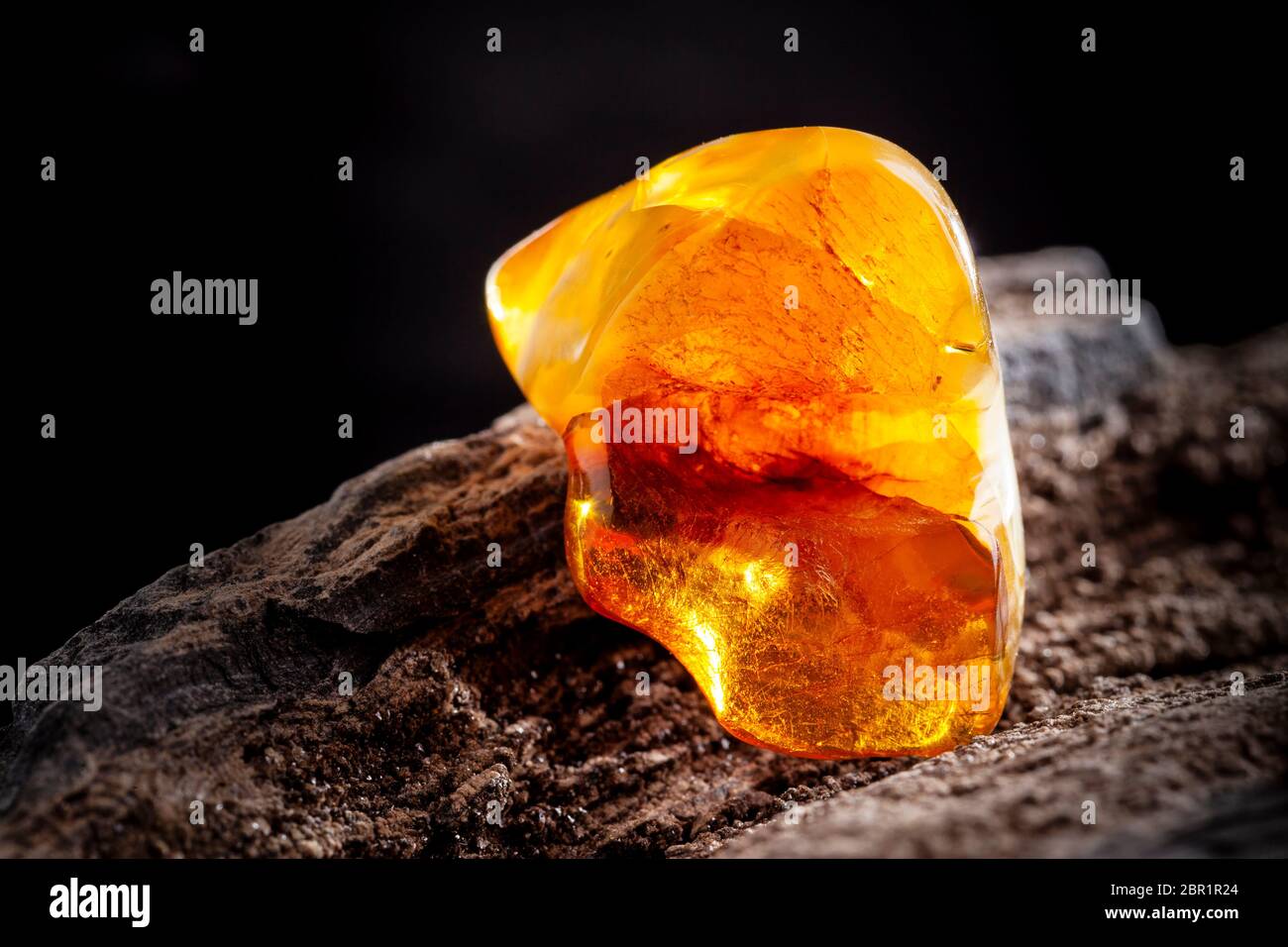 A piece of yellow semi opaque natural amber, classification color ...