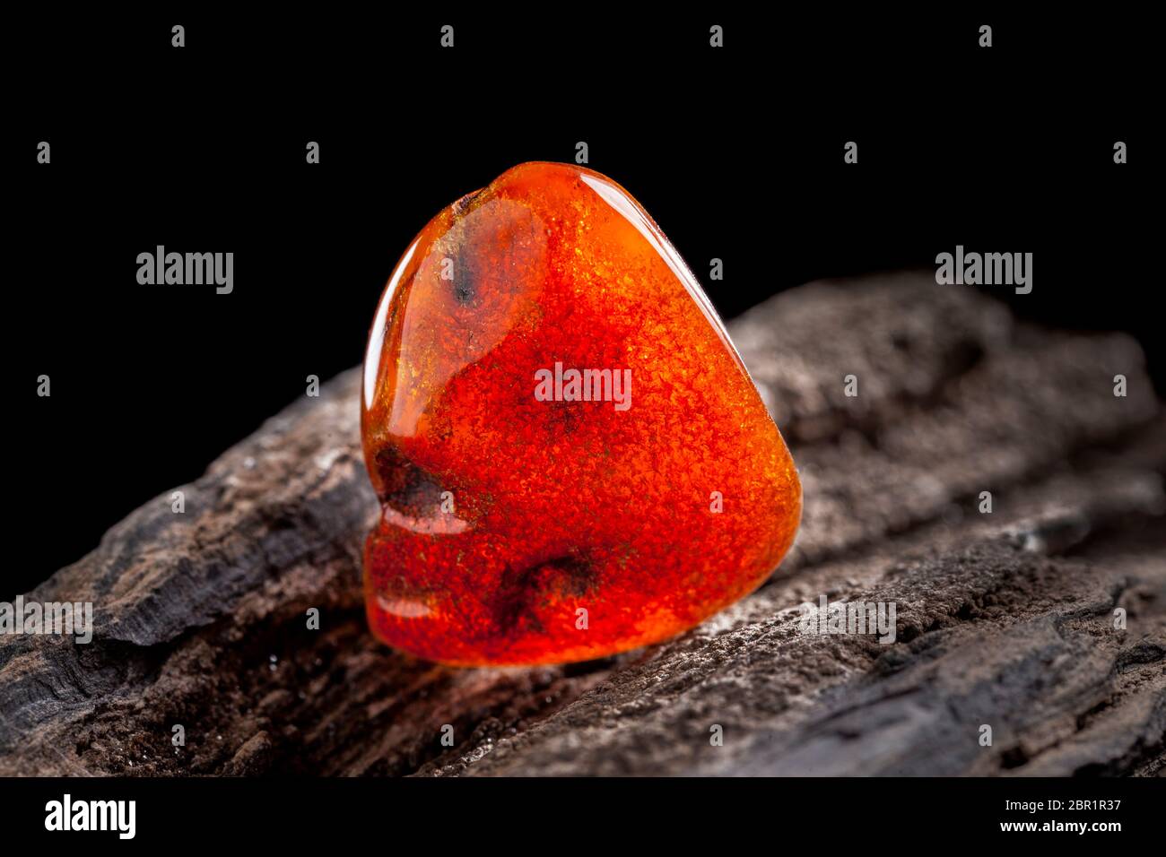 A piece of yellow semi transparent natural amber, classification color ...