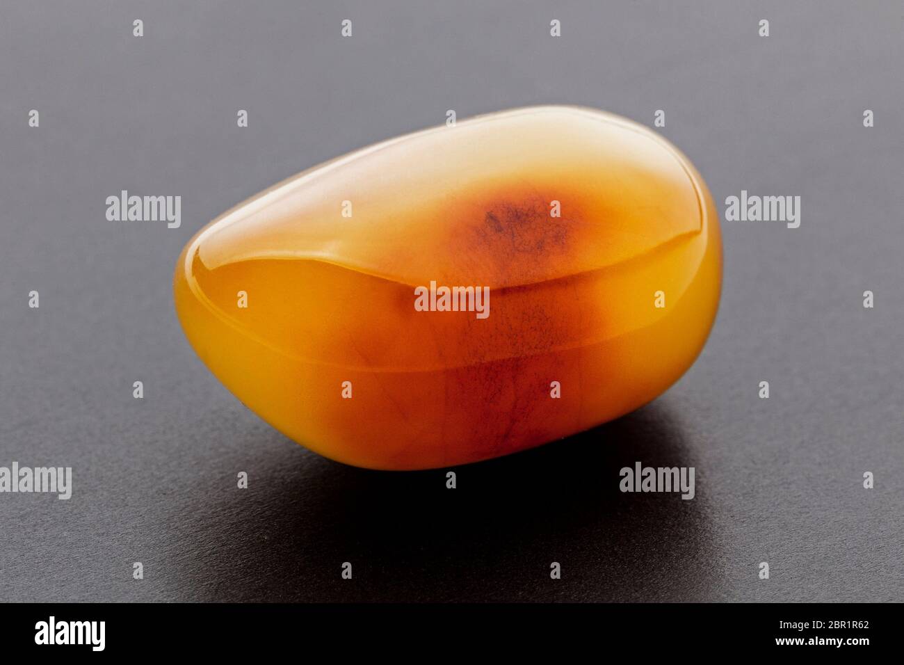 A piece of yellow opaque natural amber, classification color Bastard ...