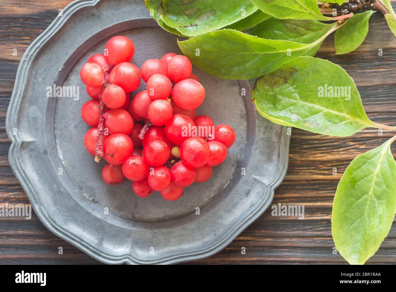Chinese magnolia vine berries on the plate Stock Photo - Alamy