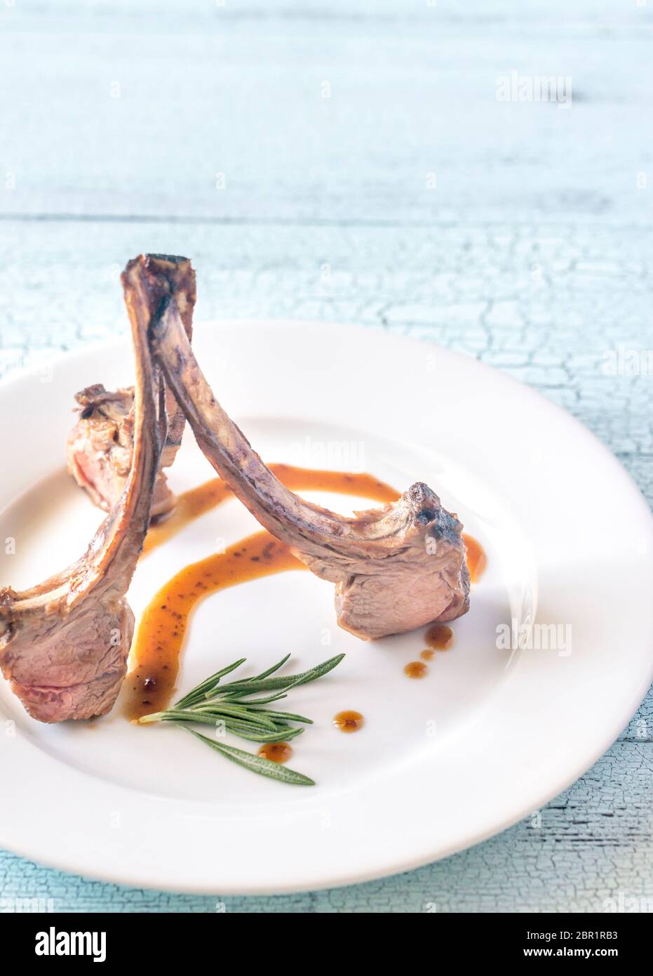 Grilled lamb rib chops on the plate Stock Photo - Alamy