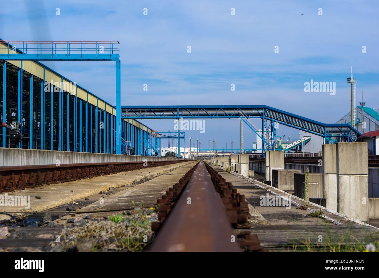 Railroad in a industrial area .Train delivering oil or gas Stock Photo ...