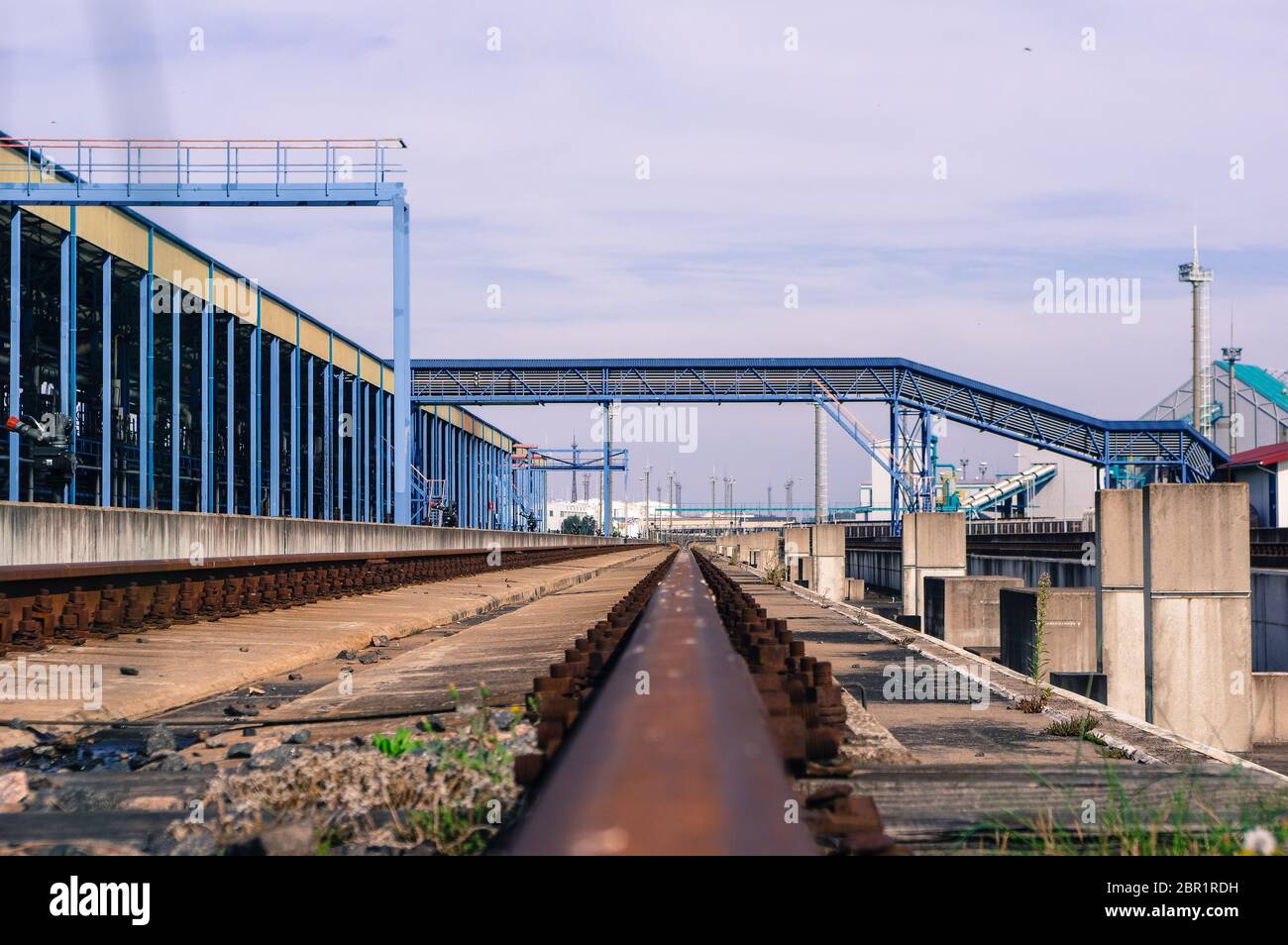 Railroad in a industrial area .Train delivering oil or gas Stock Photo ...