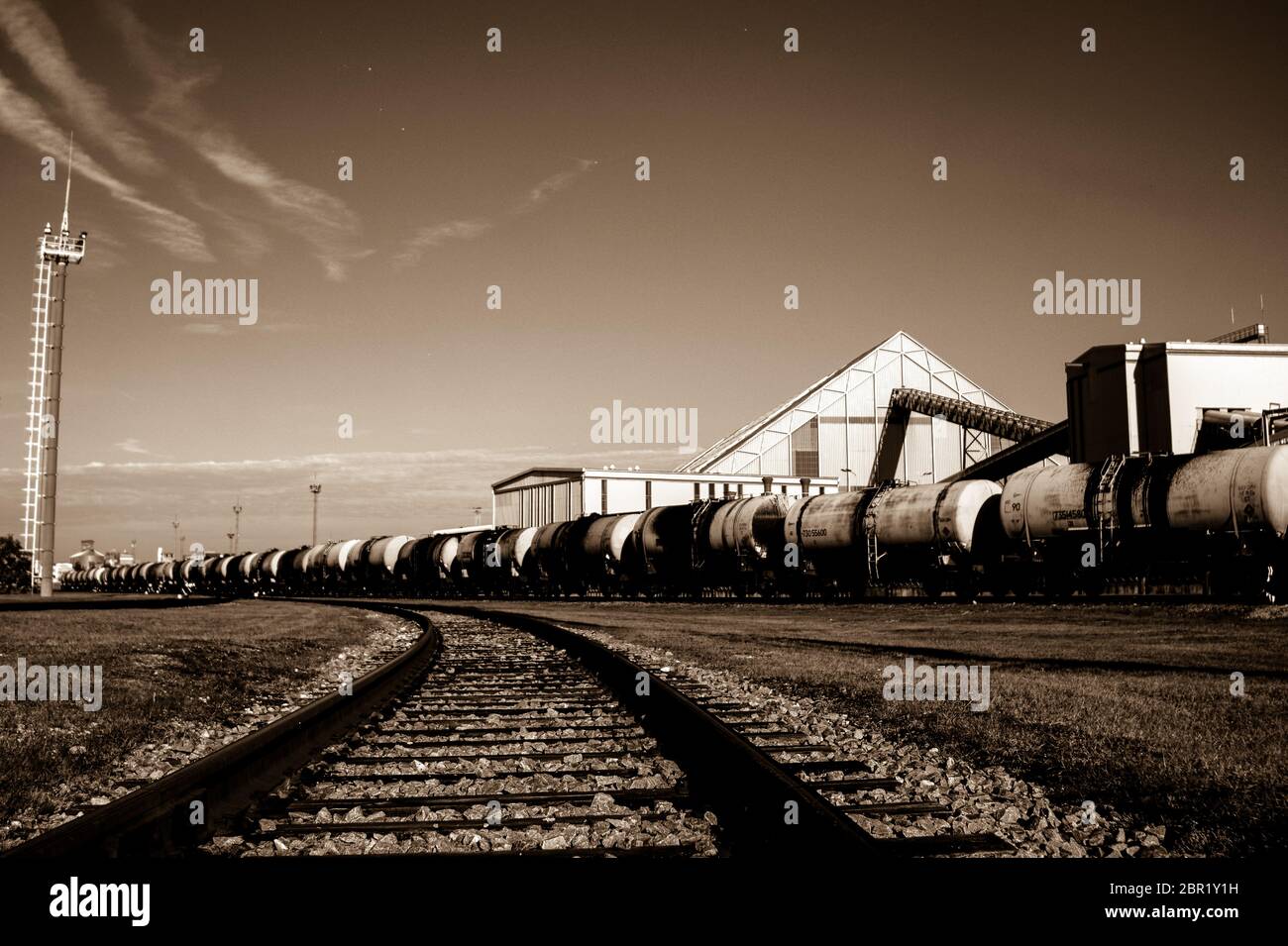 Railroad in a industrial area .Train delivering oil or gas Stock Photo ...