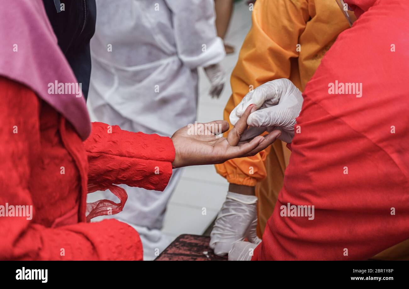 Take a blood sample for a rapid test Stock Photo - Alamy
