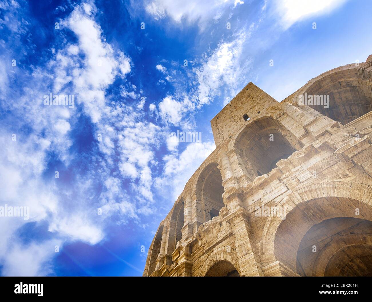 External view of beautiful roman amphitheatre against blue sky in ...