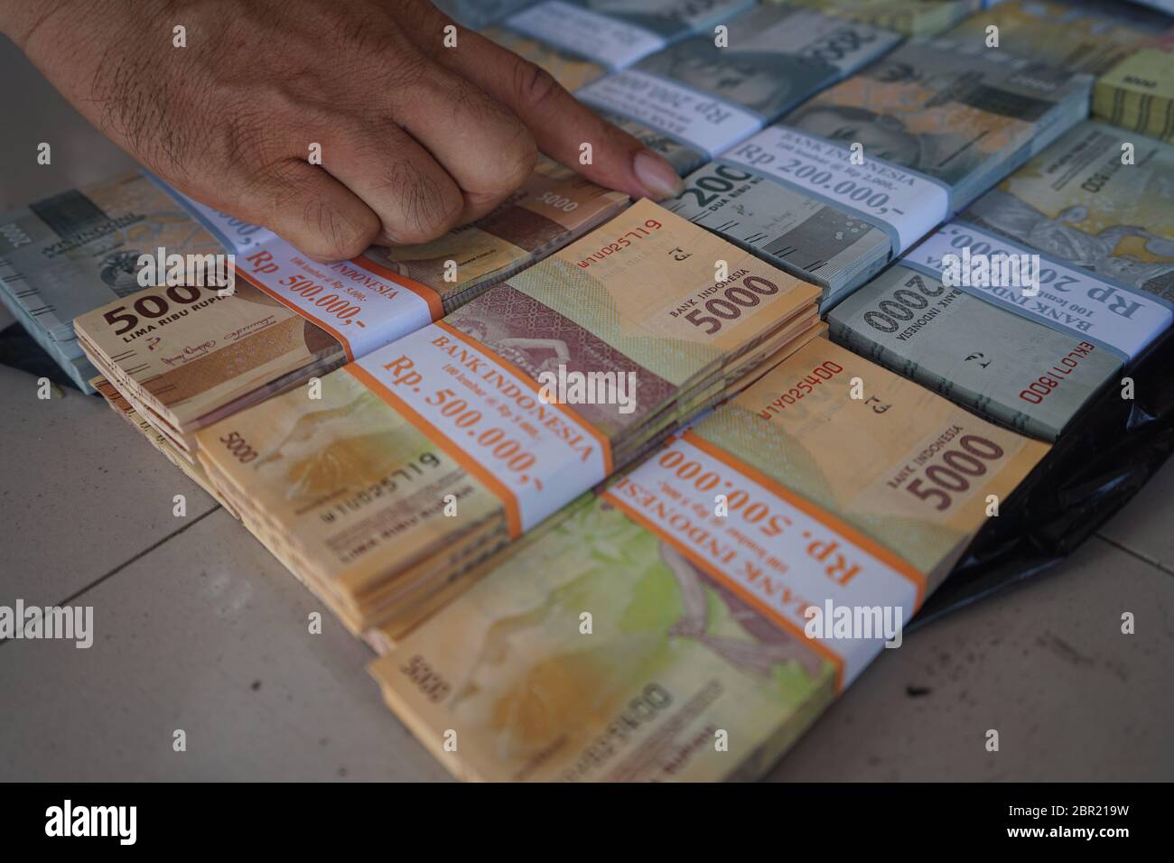 Indonesian rupiah note hi-res stock photography and images - Alamy