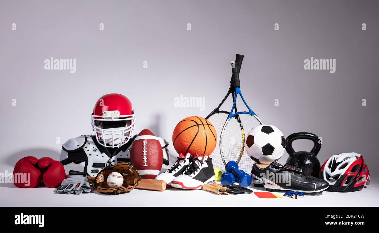 Variety Of Sport Balls And Equipment In Front Of Gray Surface Stock ...
