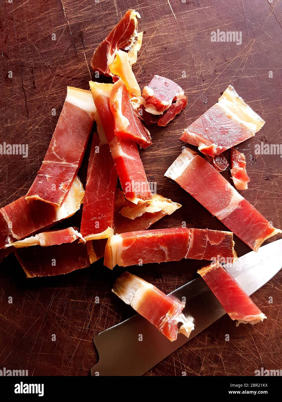 Serrano ham on a kitchen board hi-res stock photography and images - Alamy