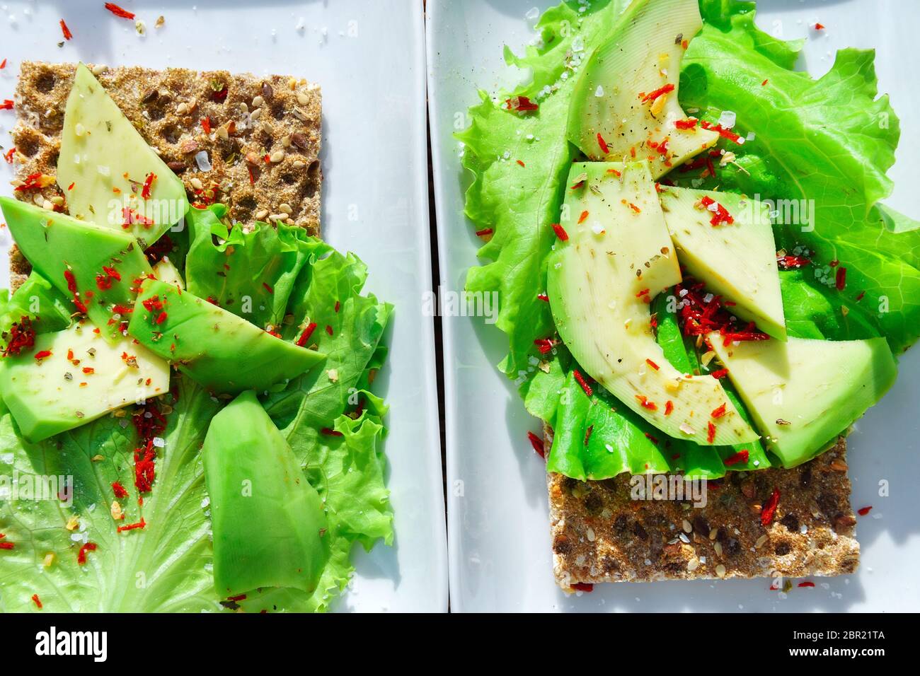 risp sandwich with avocado. Snack Bread and fiber food. Wheat crisp ...