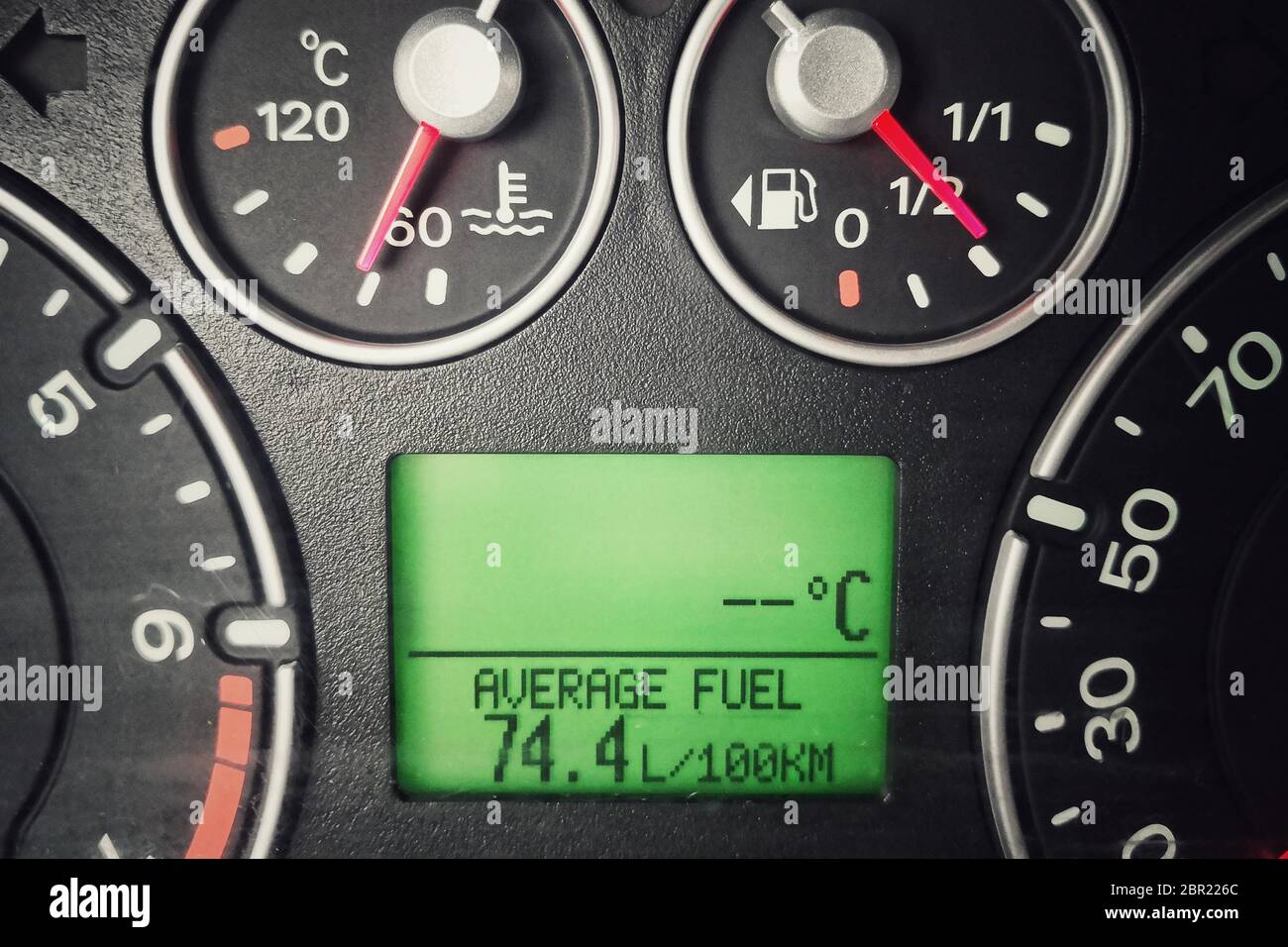 Color close up of a car's digital display, showing a very high fuel ...