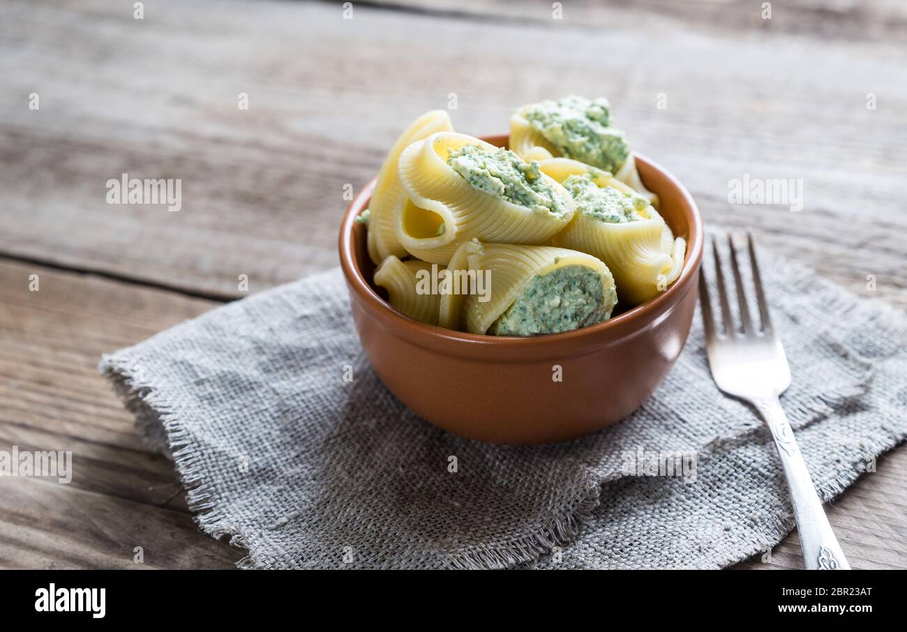 Stuffed lumaconi with cheese Stock Photo - Alamy