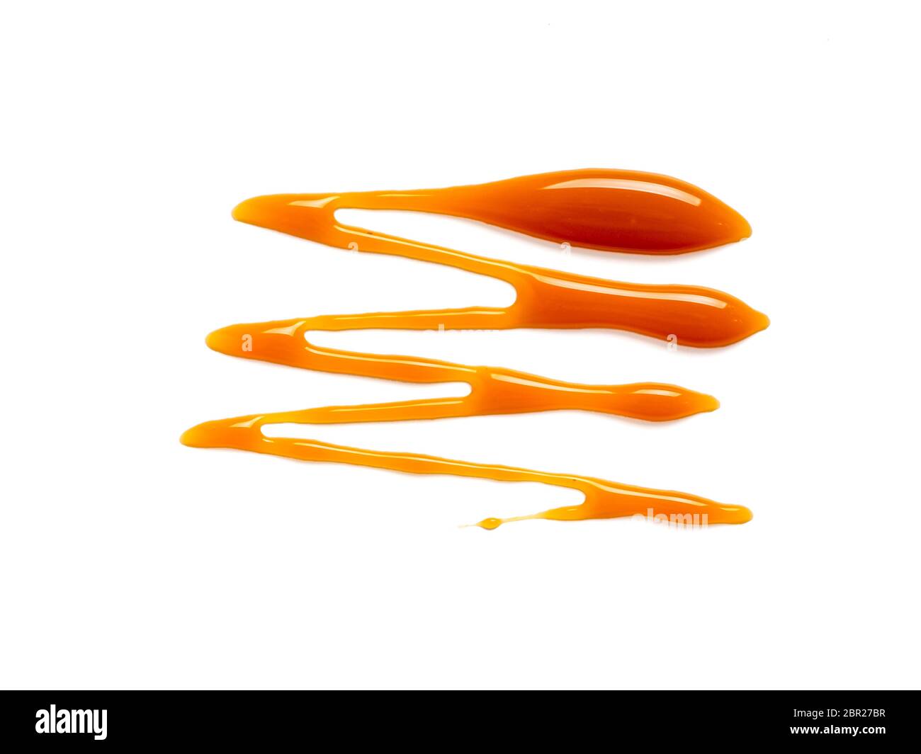 sweet caramel sauce isolated on white background Top view or flat lay ...