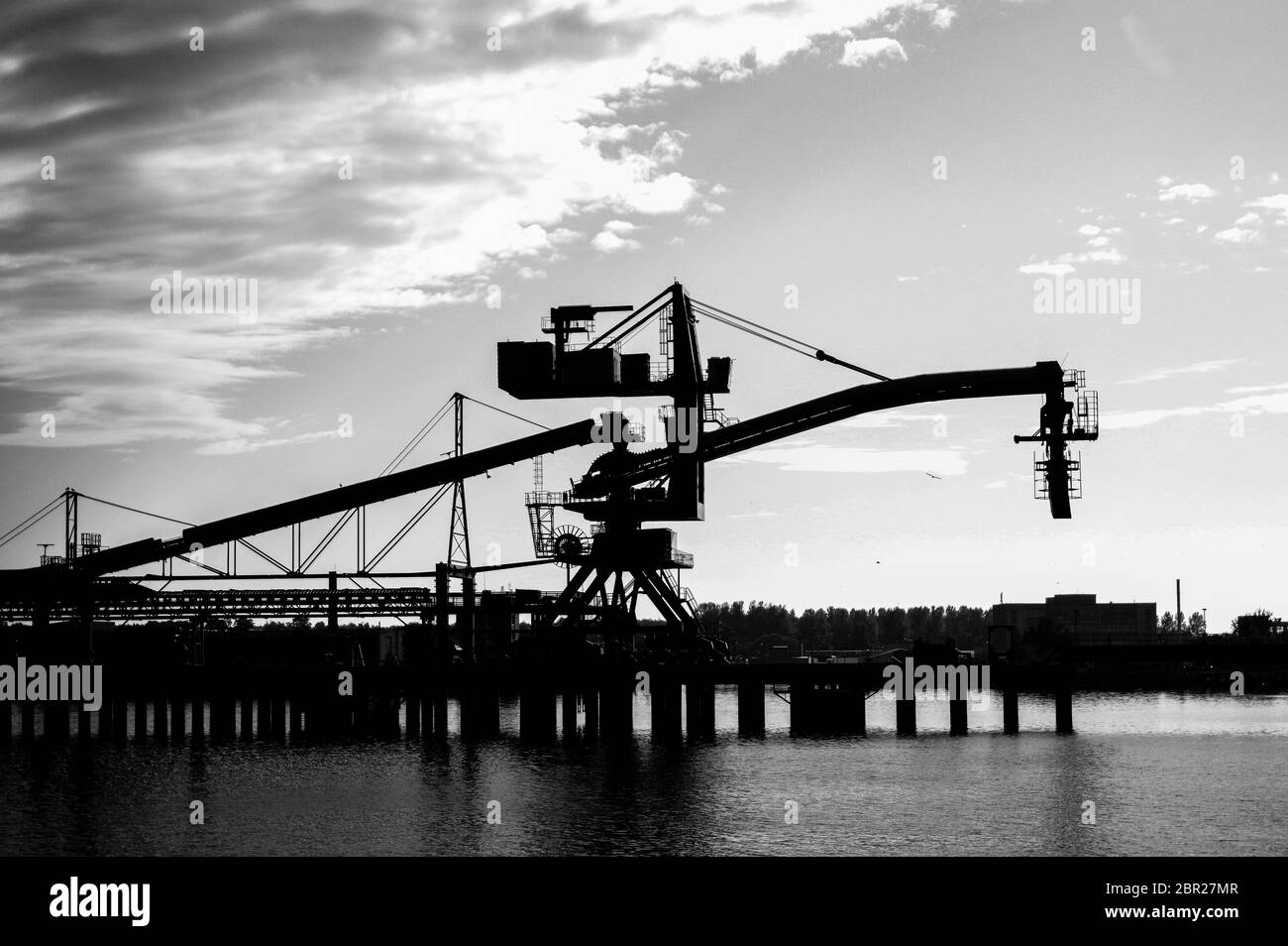 Cargo terminal for loading coal cargos by shore cranes Stock Photo - Alamy