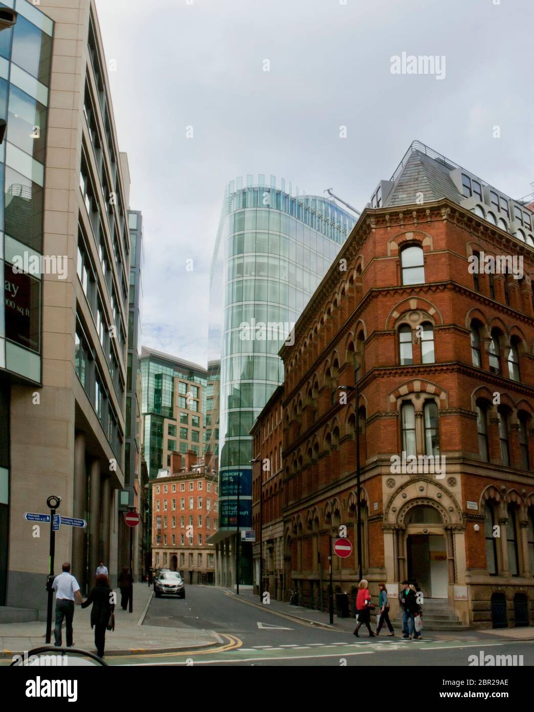 Gentrification of cities, new builds around older buildings, new and ...