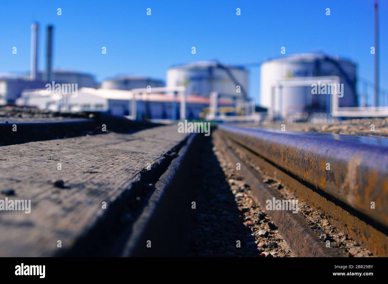 Railroad in a industrial area .Train delivering oil or gas Stock Photo ...