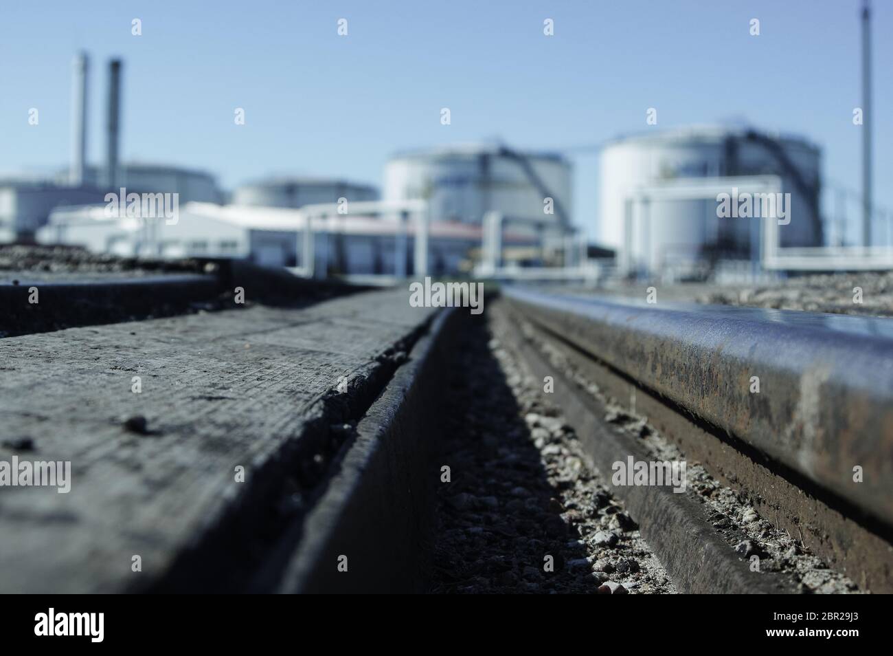 Railroad in a industrial area .Train delivering oil or gas Stock Photo ...