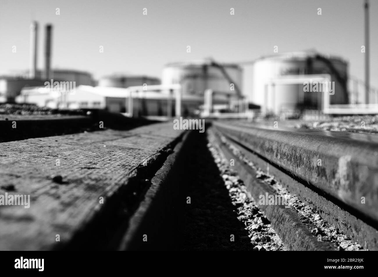 Railroad in a industrial area .Train delivering oil or gas Stock Photo ...