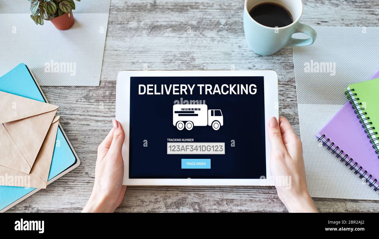 Delivery tracking form on device screen. E-commerce and business ...