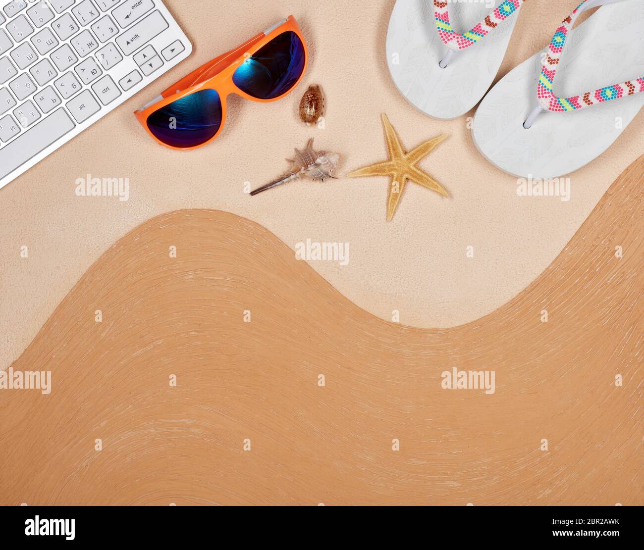 Still life with flip flops, sunglasses, seashells and computer keyboard ...
