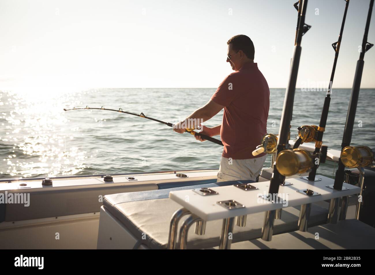 Man with a fishing rod hi-res stock photography and images - Alamy